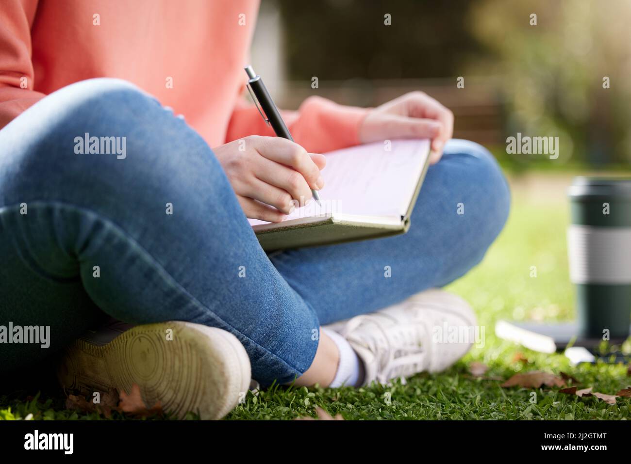 Adult female sitting writing hi-res stock photography and images - Alamy