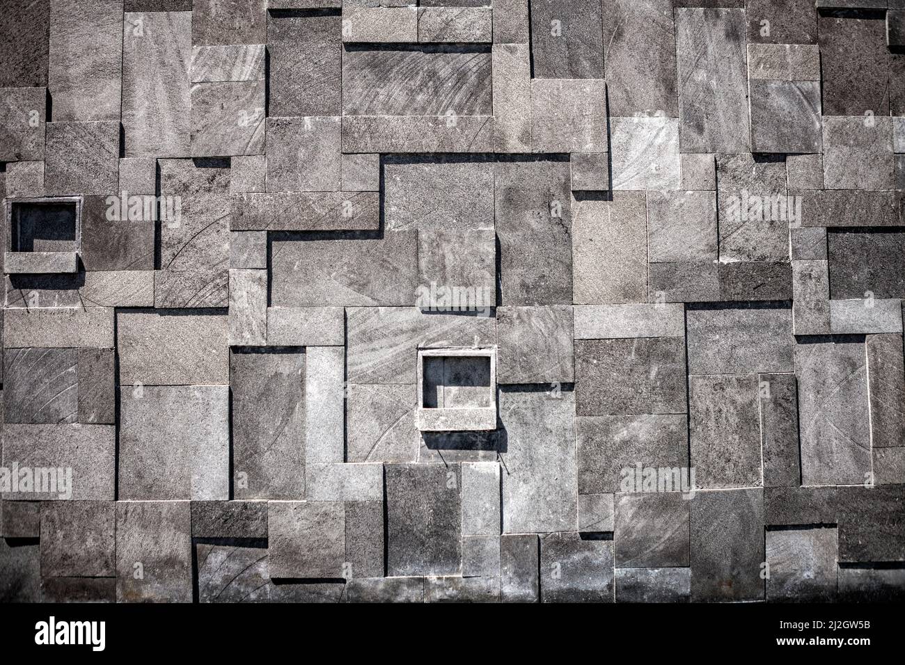 Wall of different stone squares, abstract pattern Stock Photo - Alamy