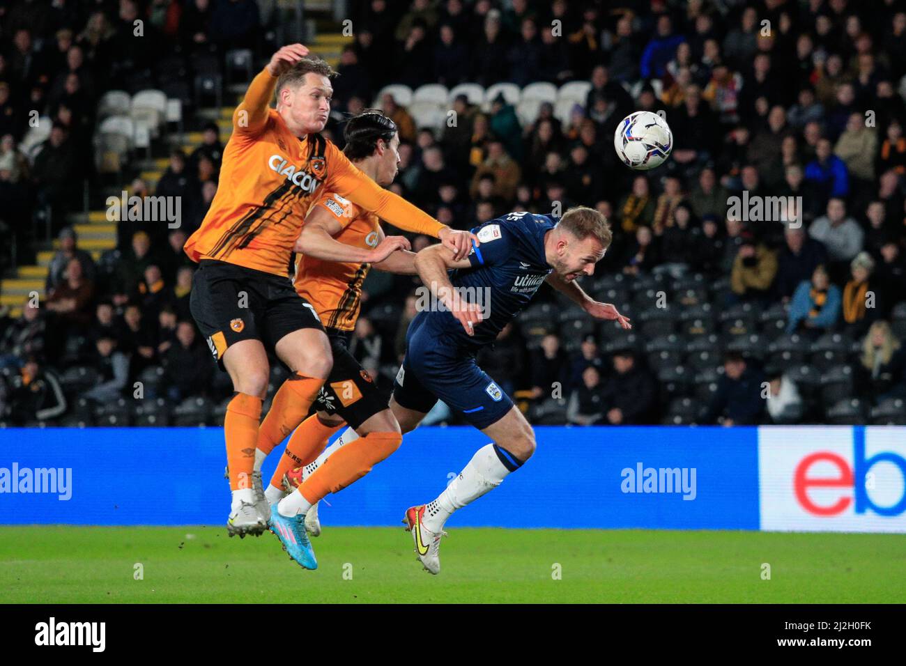 Jordan Rhodes #9 of Huddersfield Town fails to head the ball resulting ...