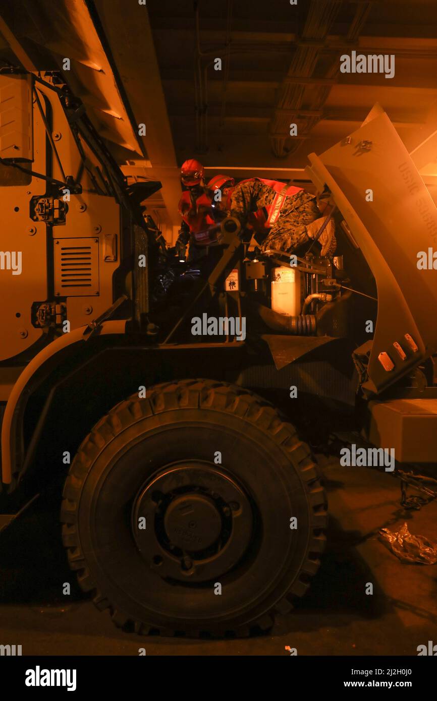 U.S. Marine Corps Lance Cpl. Wascar C. Alcantara, center, and Pfc ...