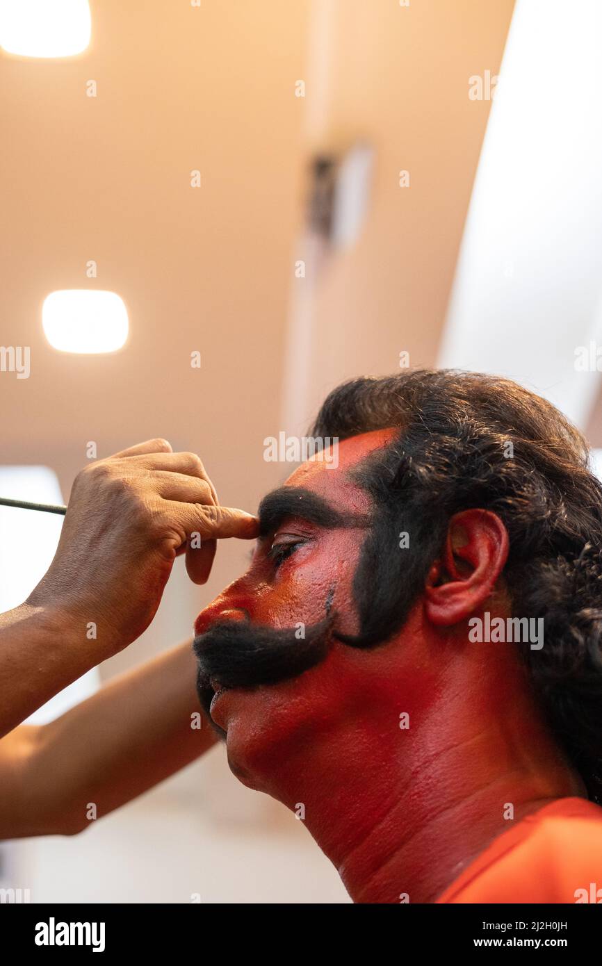 Third eye being drawn on the forehead of the man dressed as Virabhadra ...