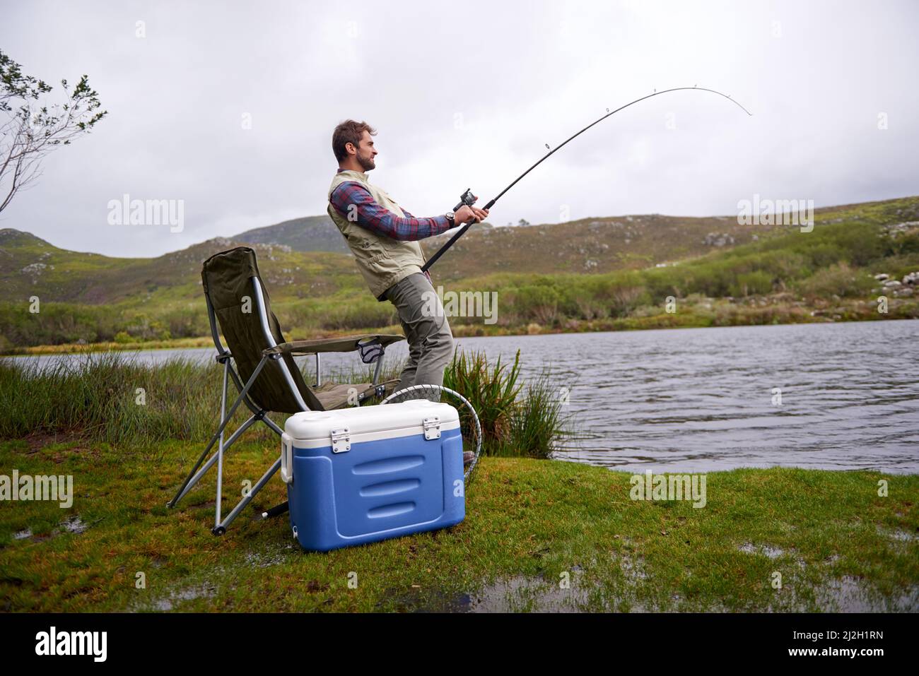 Handsome young fisherman hi-res stock photography and images - Alamy