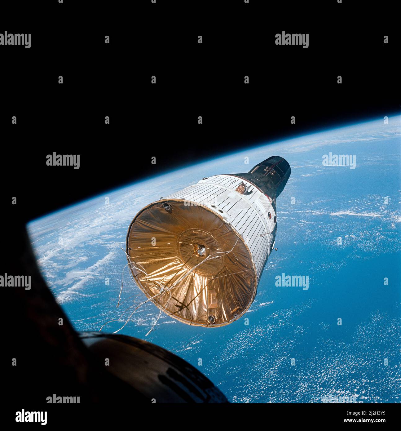This photograph of the Gemini 7 spacecraft was taken from Gemini 6 ...