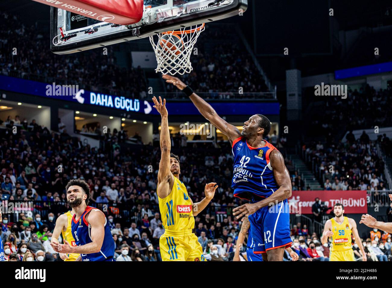 Maodo Lo (L2) of Alba Berlin and Bryant Dunston (R) of Anadolu Efes ...