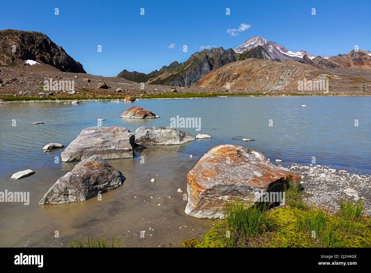 WA21259-00...WASHINGTON - Glacier Peak and glacial melt lake below the ...