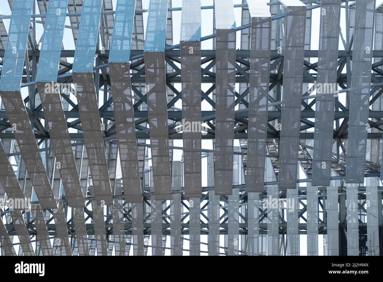 Curly steel structure under blue sky Stock Photo - Alamy