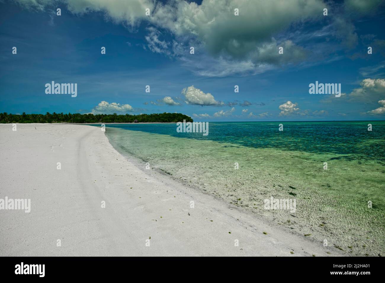 Ngurtafur Beach, which stretches across the open sea, is located on the ...