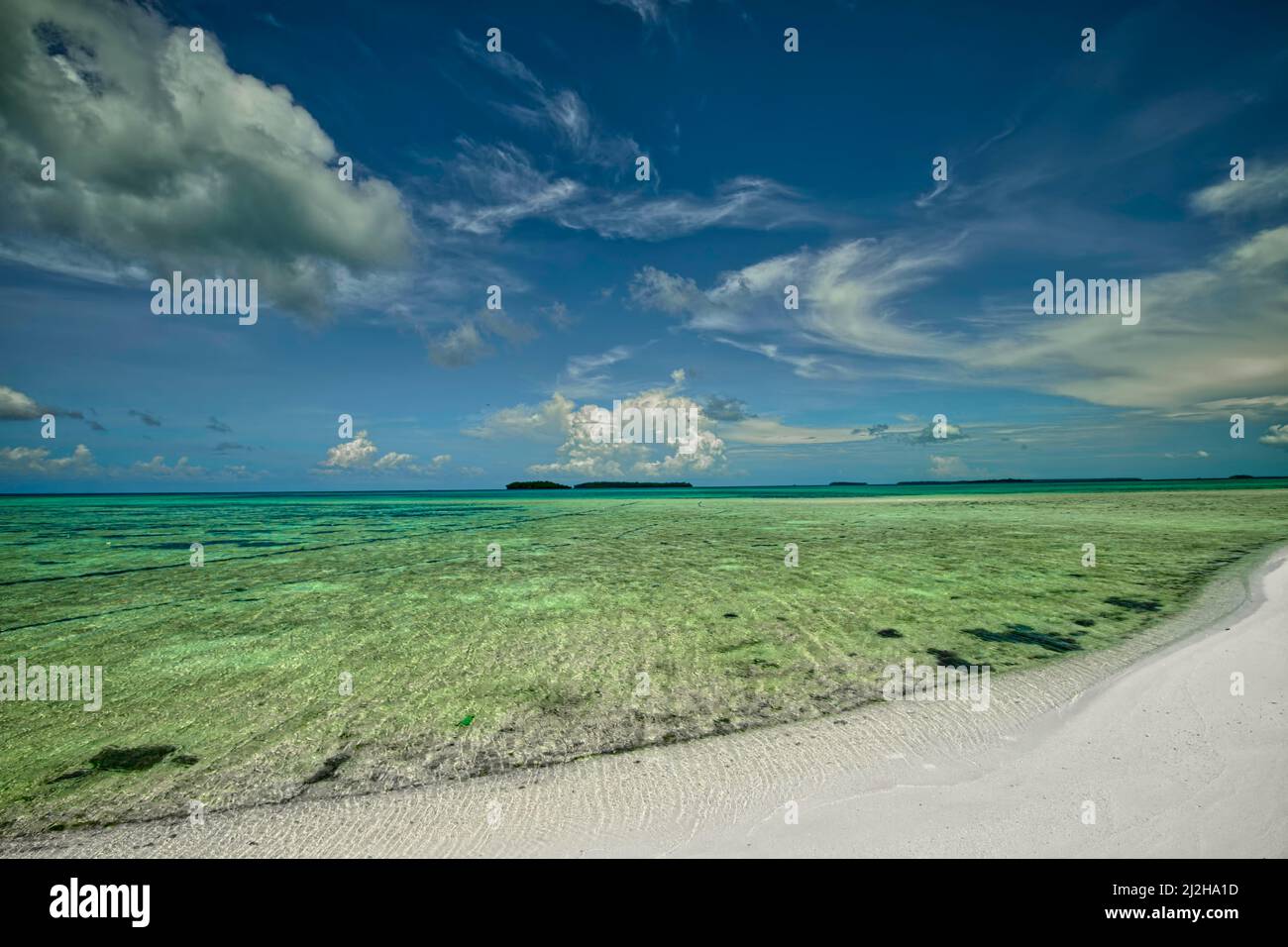 Ngurtafur Beach, which stretches across the open sea, is located on the ...