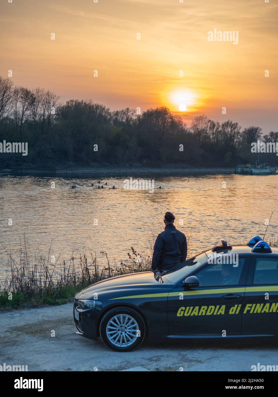 IRS tax evasion police guardia di finanza at sunset in the coast of ...
