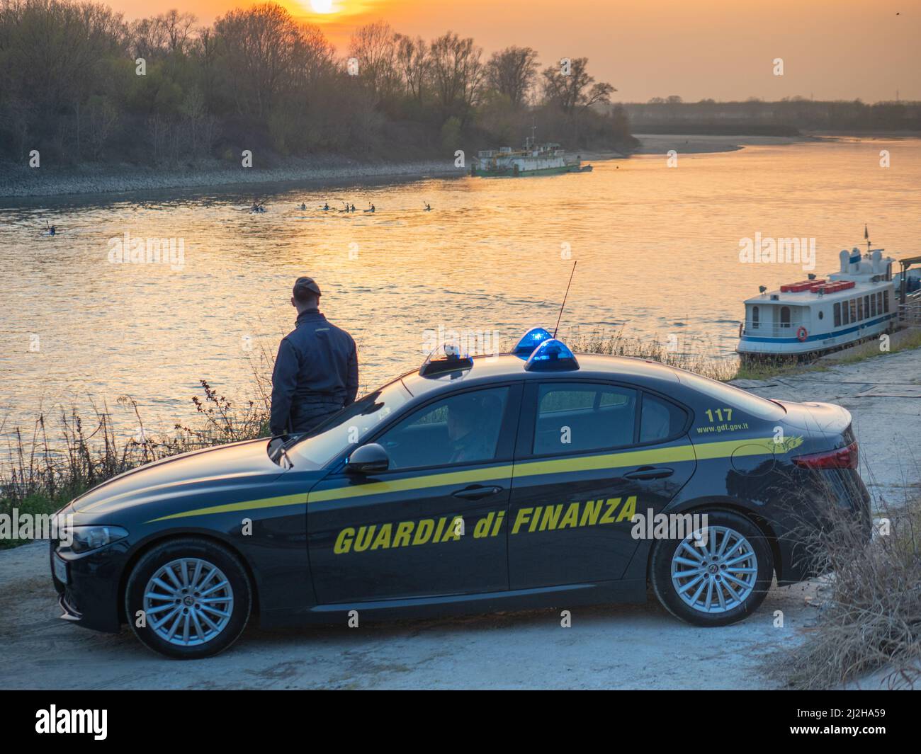 IRS tax evasion police guardia di finanza at sunset in the coast of ...
