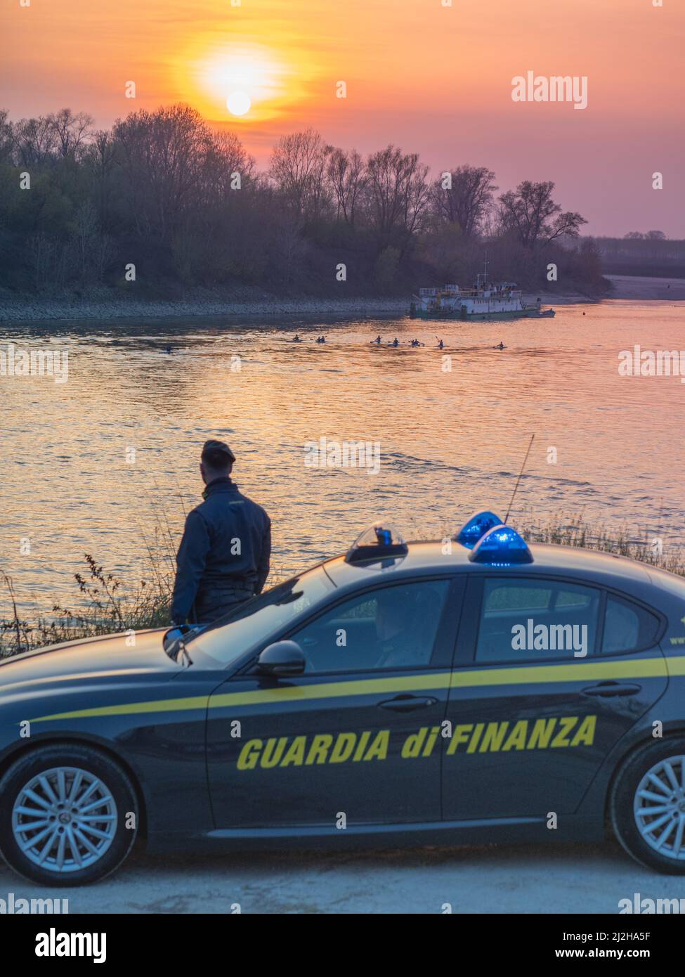 IRS tax evasion police guardia di finanza at sunset in the coast of ...