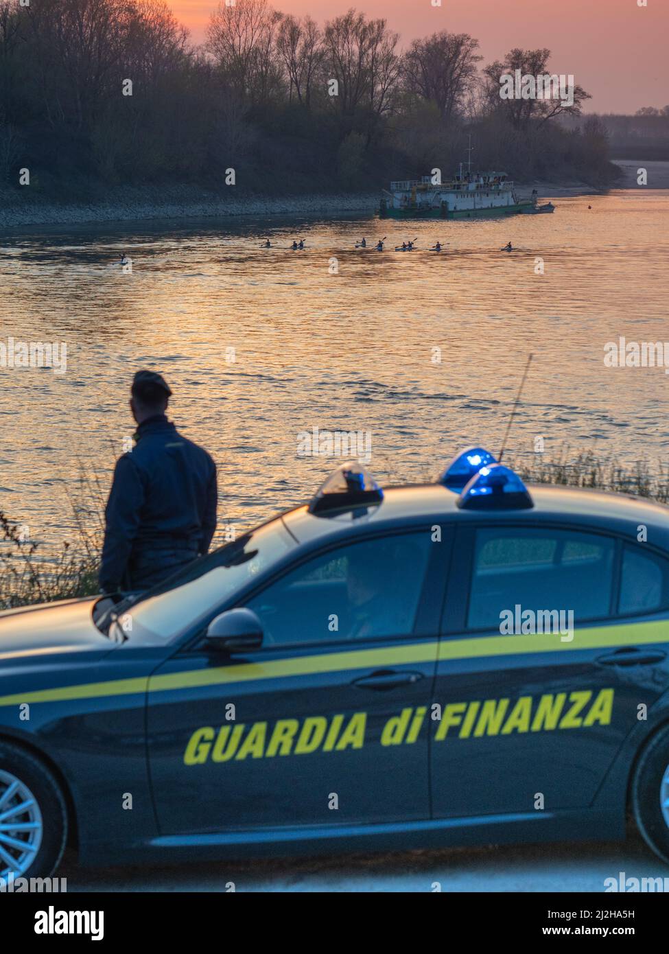IRS tax evasion police guardia di finanza at sunset in the coast of ...