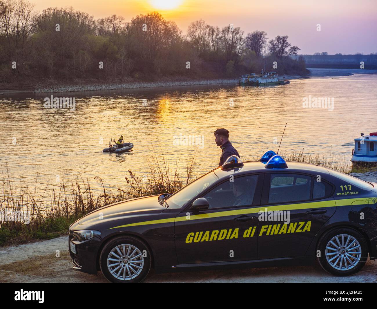 IRS tax evasion police guardia di finanza at sunset in the coast of ...