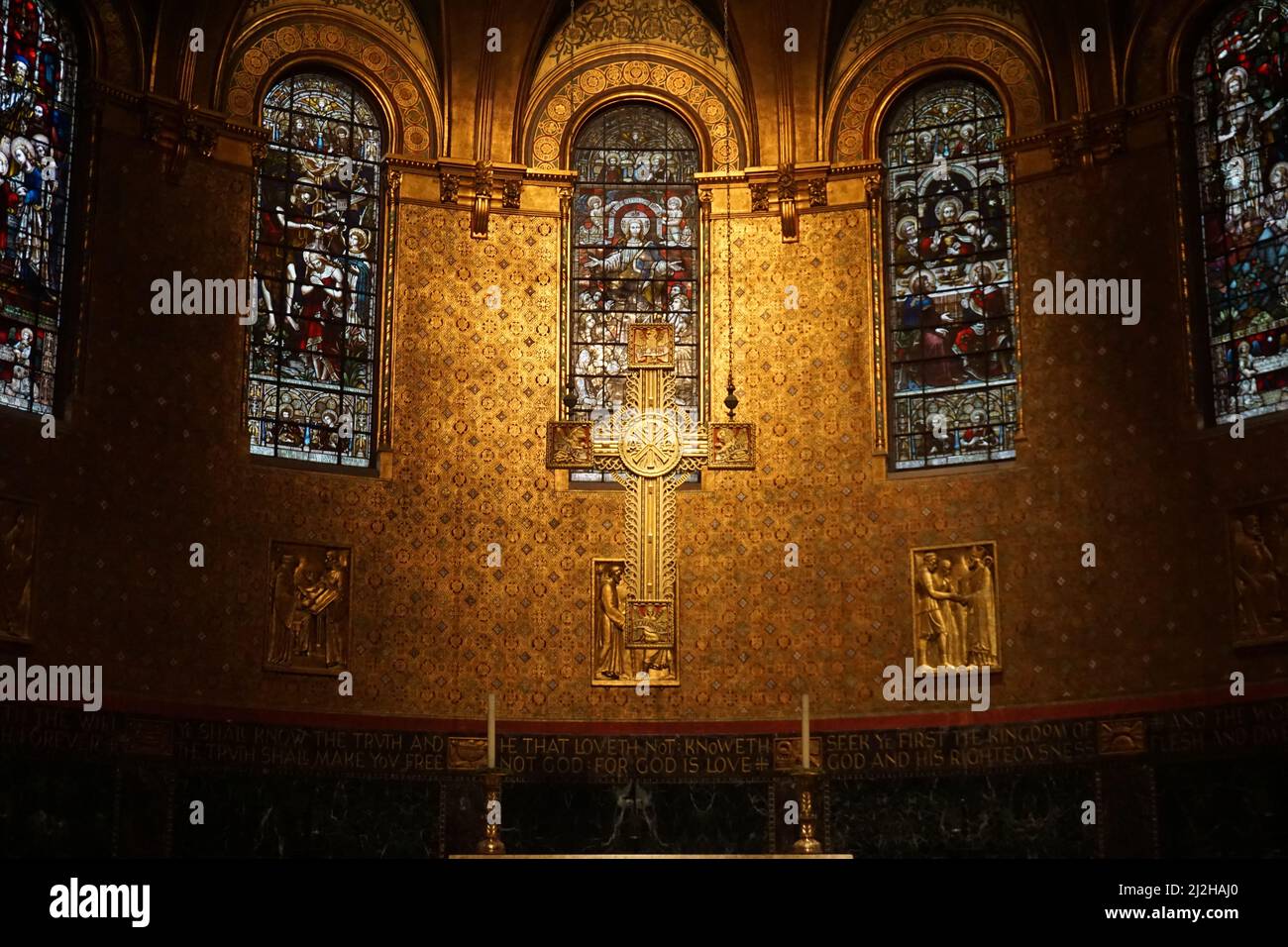 An interior view of a church with a cross hanging in the middle Stock ...