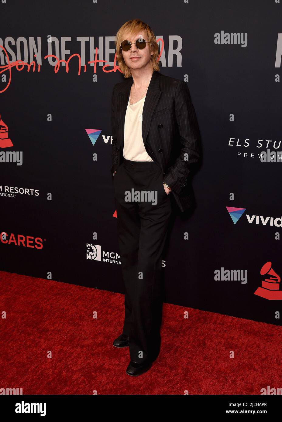 Beck walking on the red carpet at the 31st Annual MusiCares Person of ...