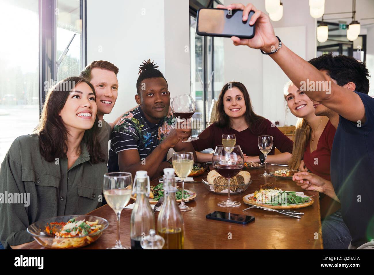 Six young adult friends taking hi-res stock photography and images - Alamy