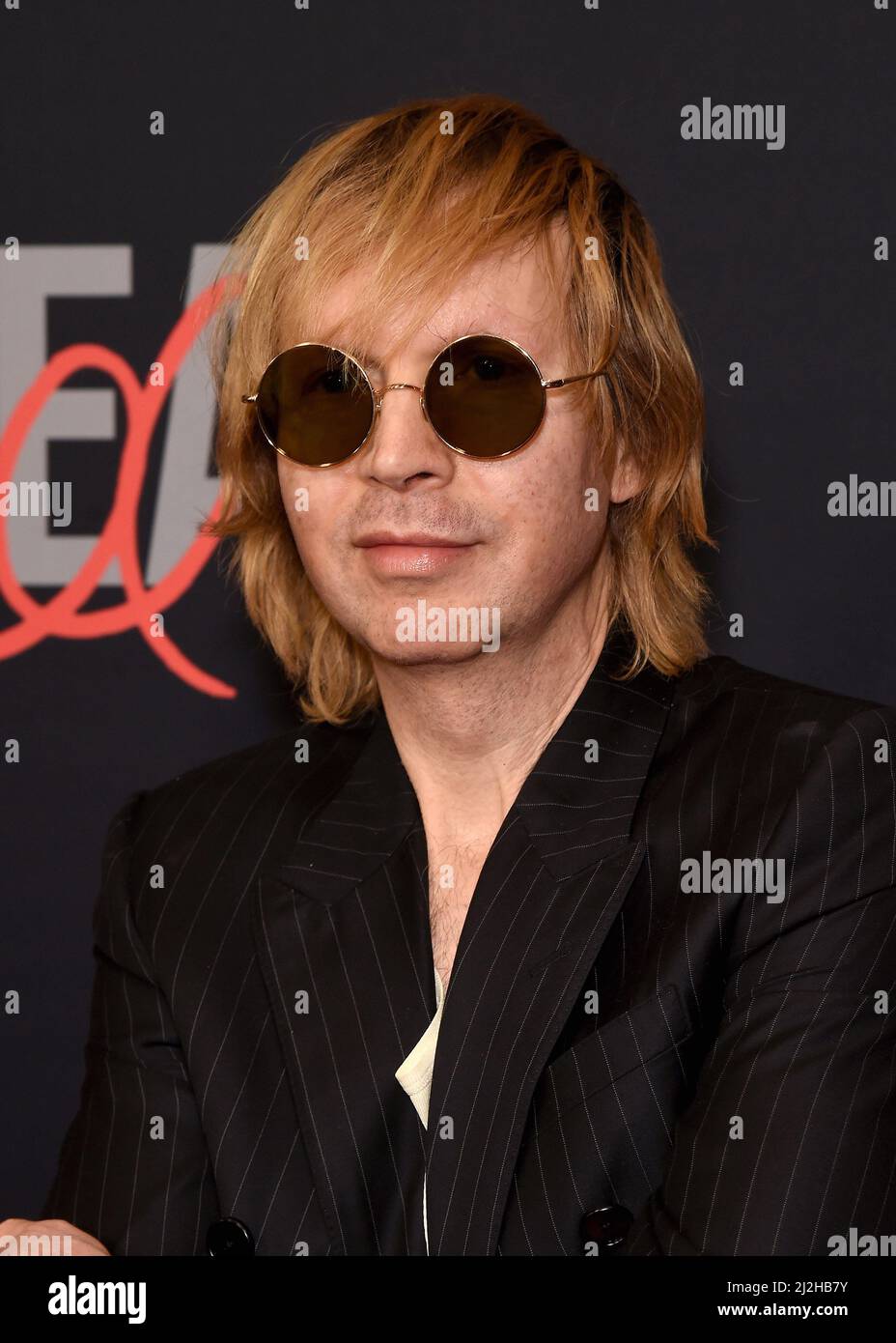 Beck walking on the red carpet at the 31st Annual MusiCares Person of ...