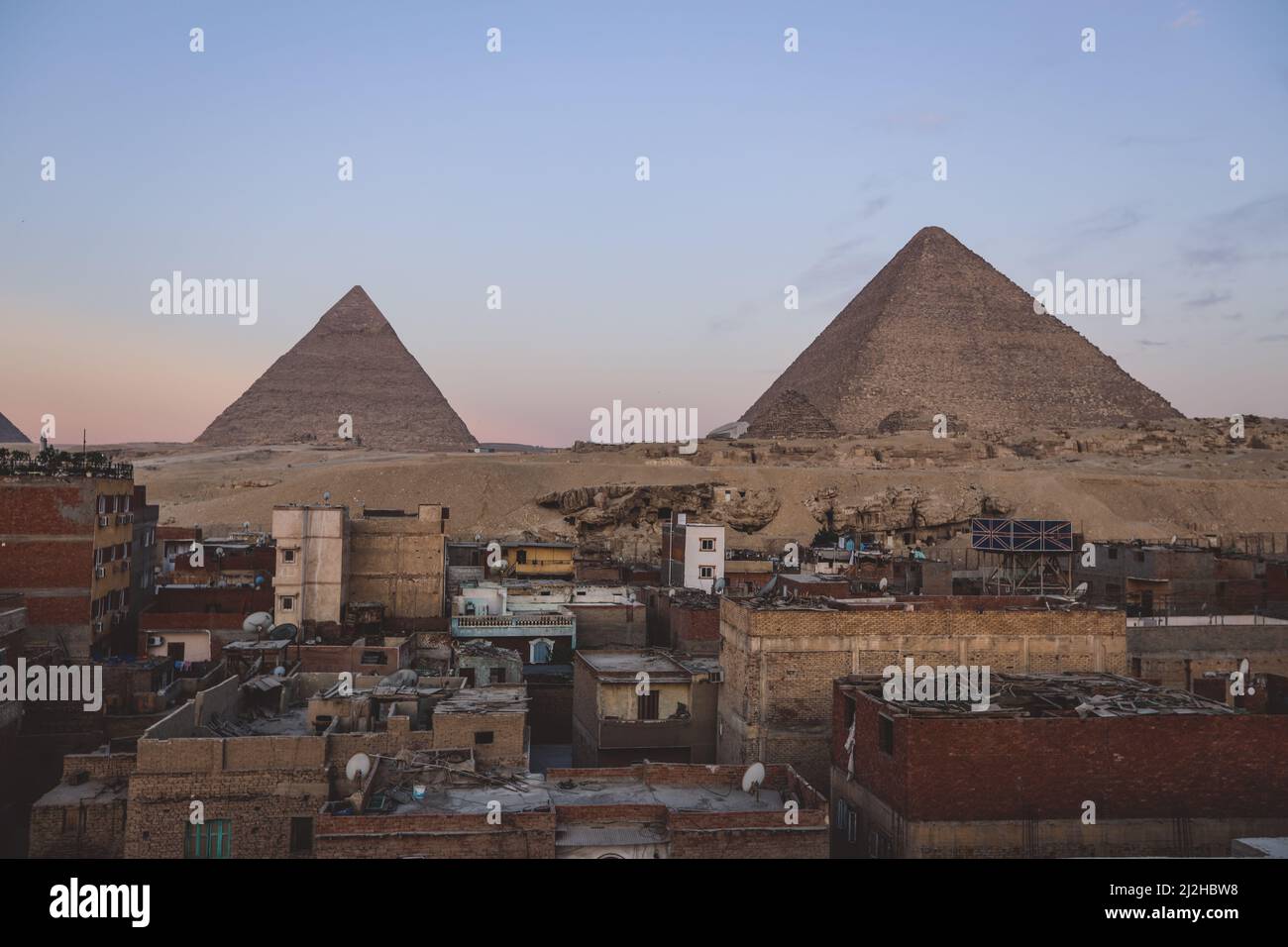 View of the Pyramids of Giza from the city Stock Photo - Alamy