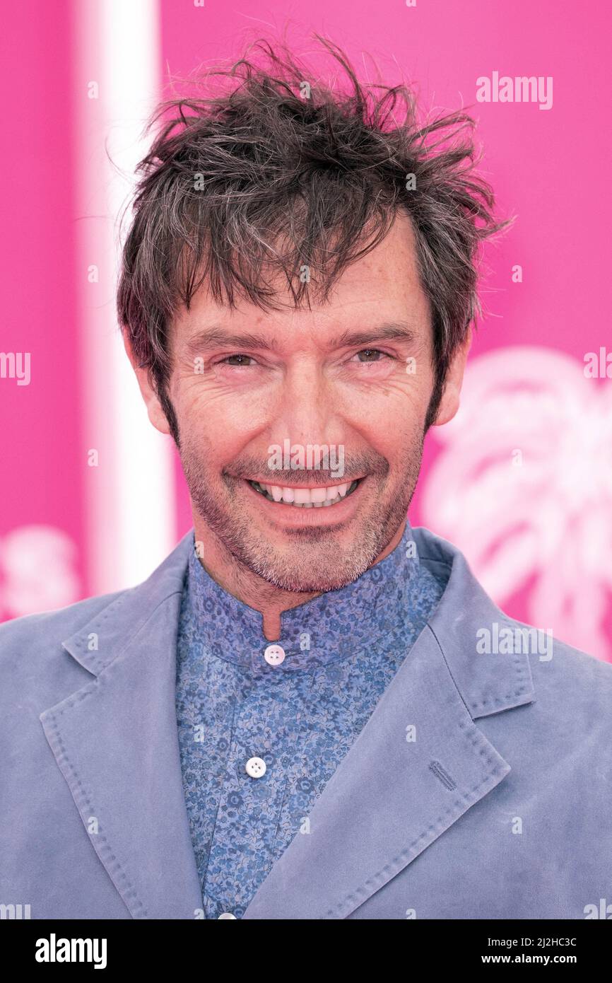 Franck Semonin poses on the pink carpet during the opening ceremony of ...