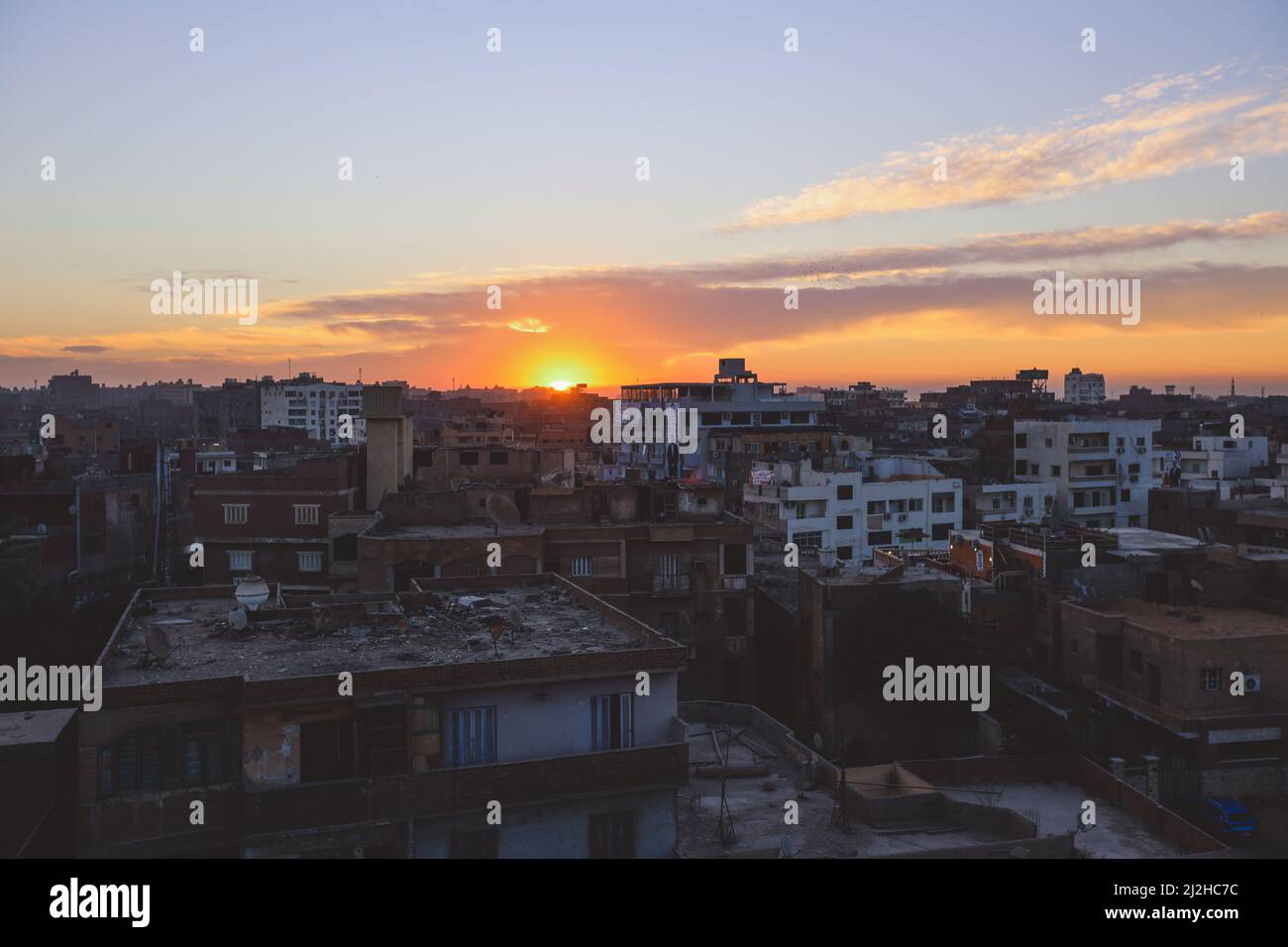 Sunset Cityscape View to the Giza City with the Colorful Sky and Local ...