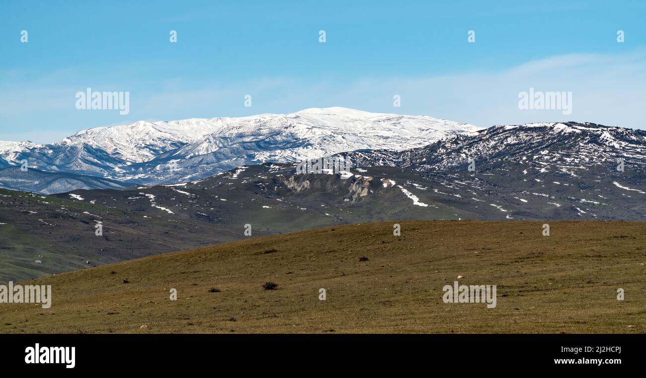 Melting snow on highland mountain hi-res stock photography and images ...