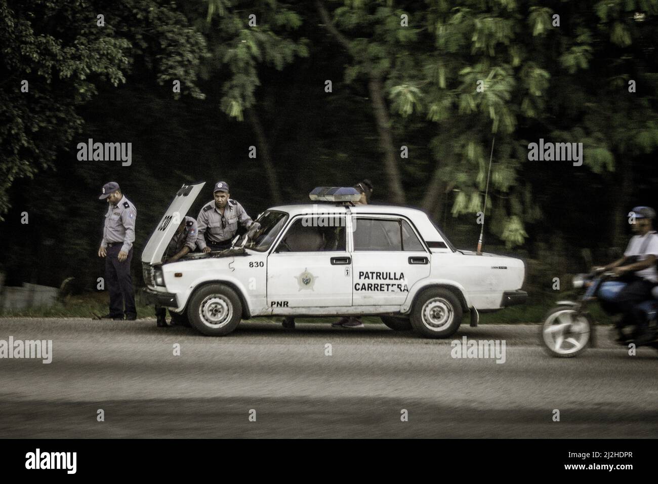 A shot of a damaged old Lada 2105 police car in the poor city of La ...
