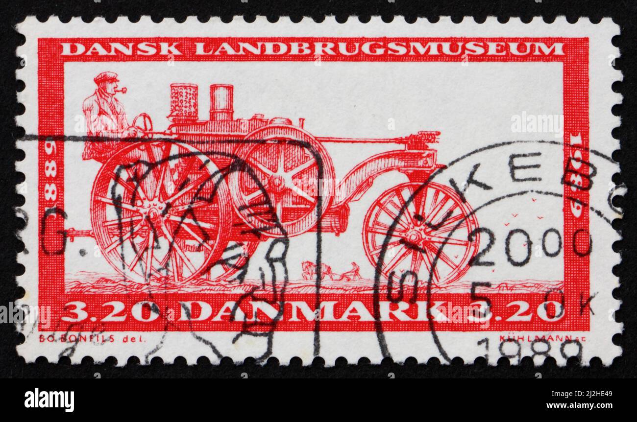 DENMARK - CIRCA 1989: a stamp printed in the Denmark shows Tractor from ...