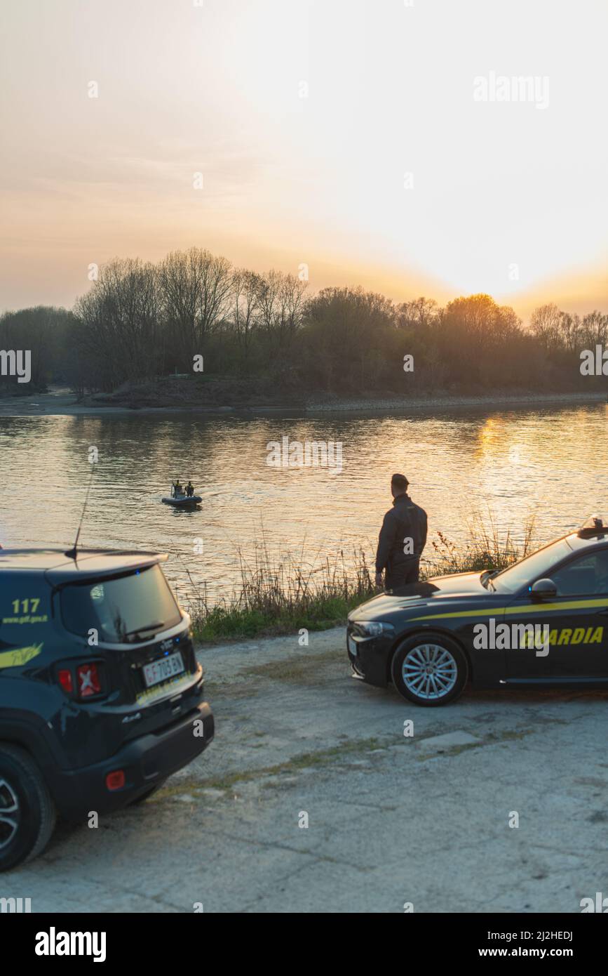 IRS tax evasion police guardia di finanza at sunset in the coast of ...