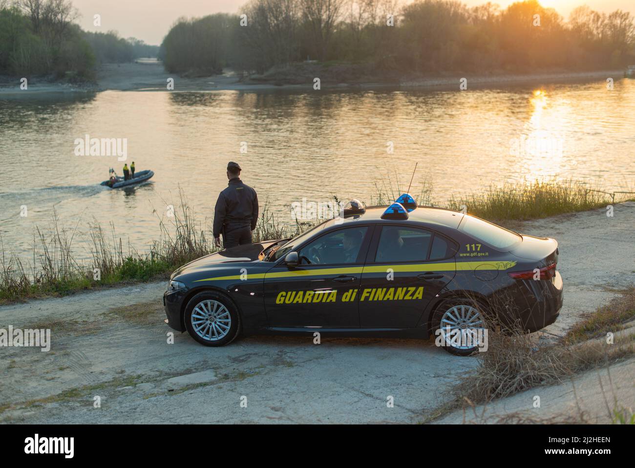 IRS tax evasion police guardia di finanza at sunset in the coast of ...