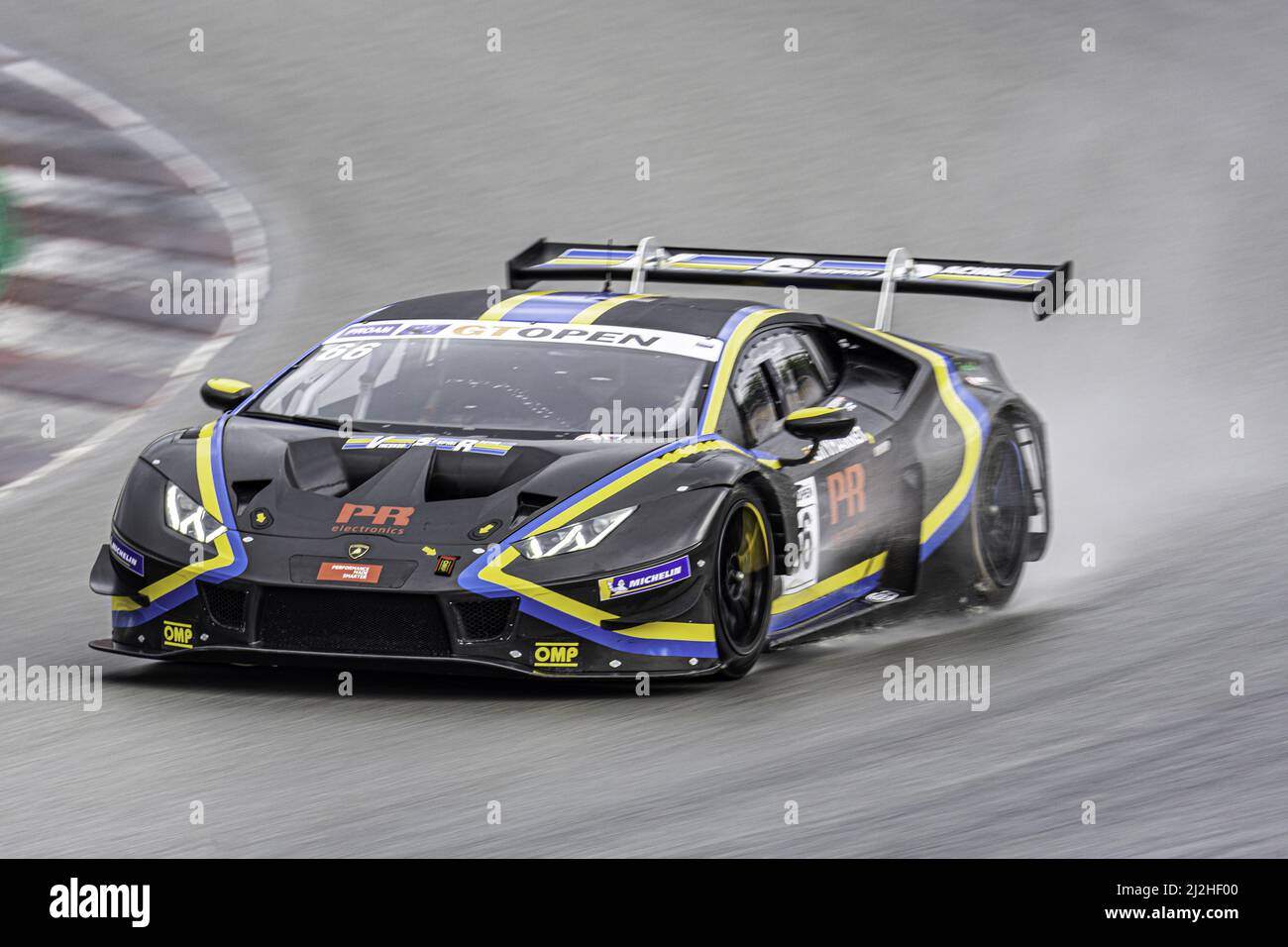 An Italian supercar on a track on a rainy day - Lamborghini Huracan ...