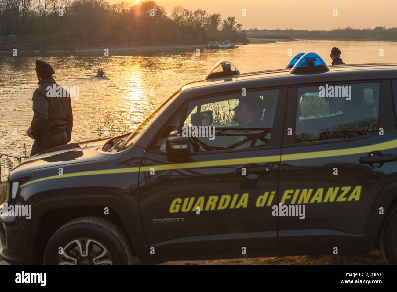 IRS tax evasion police guardia di finanza at sunset in the coast of ...
