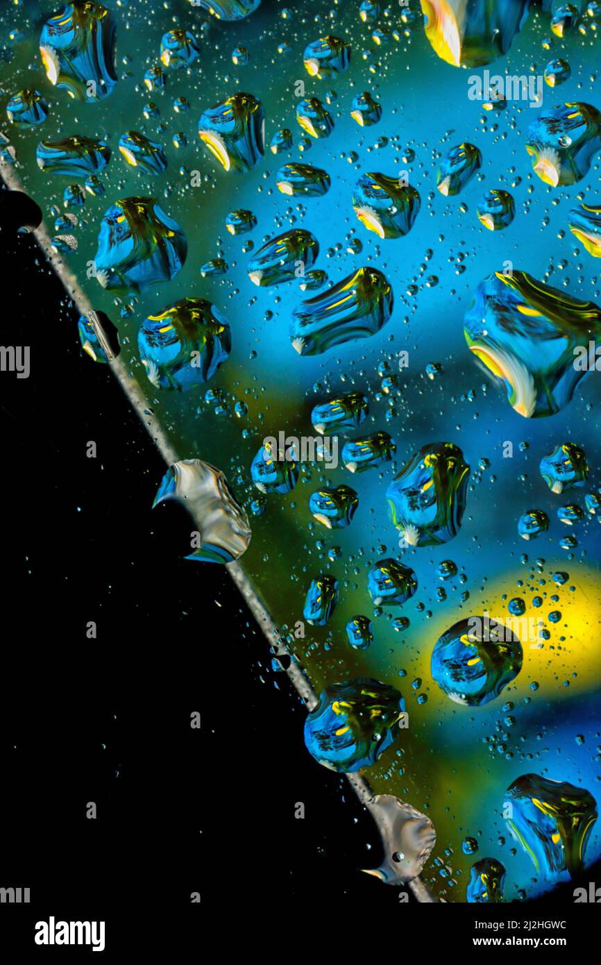 Abstract irregular water drops macro showing reflected colours Stock ...