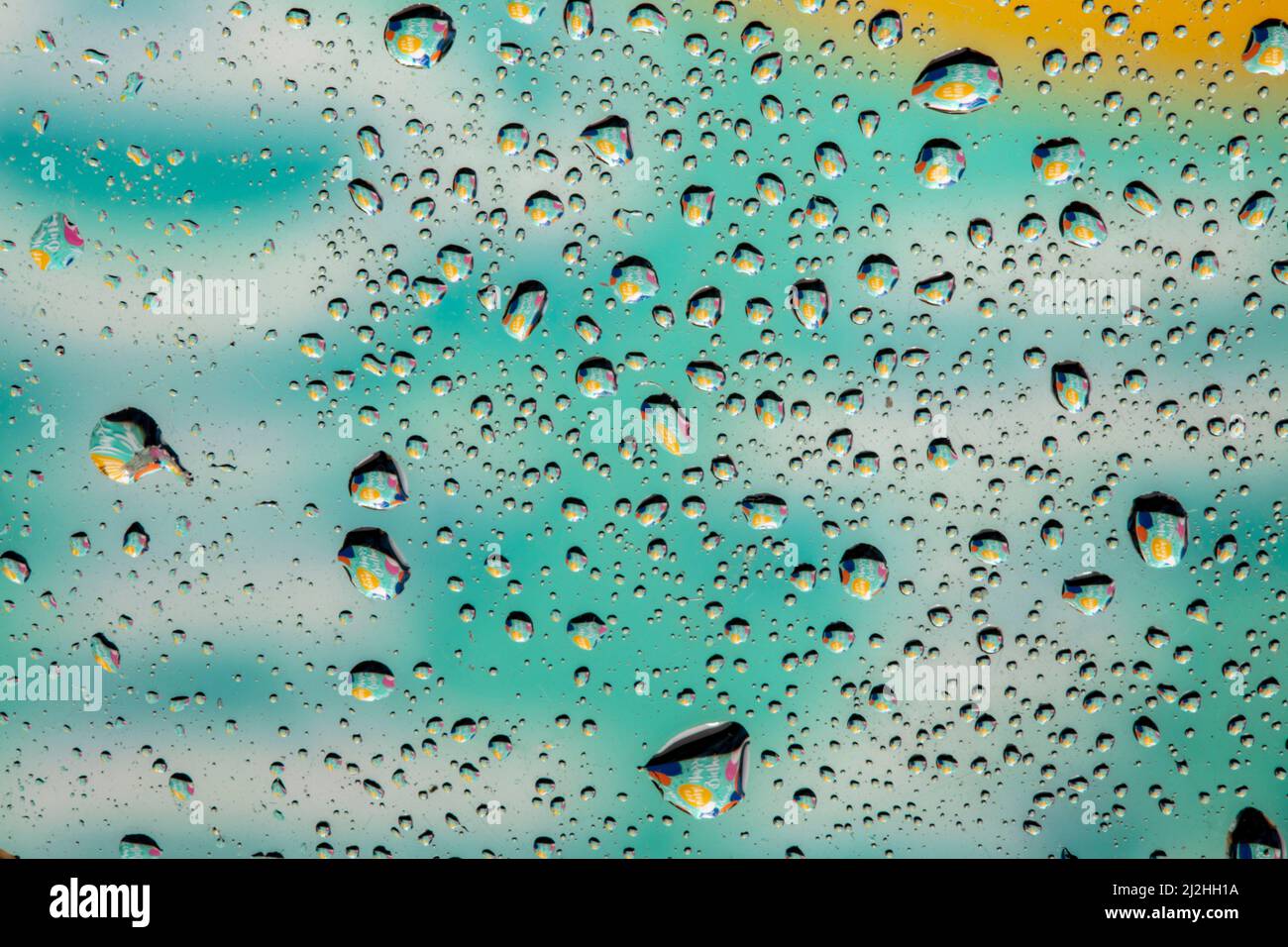 Abstract irregular water drops macro showing reflected colours Stock ...