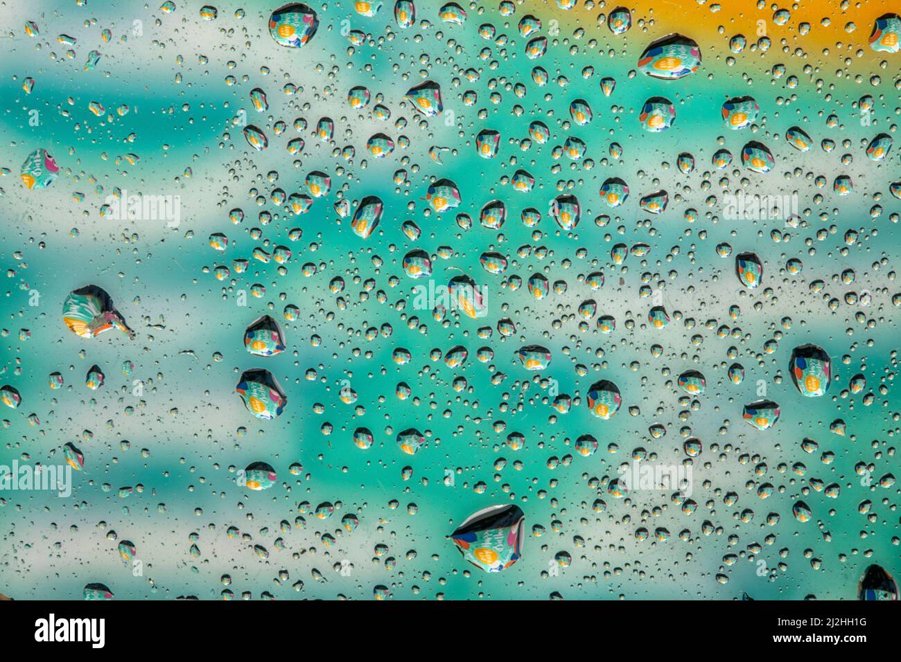 Abstract irregular water drops macro showing reflected colours Stock ...