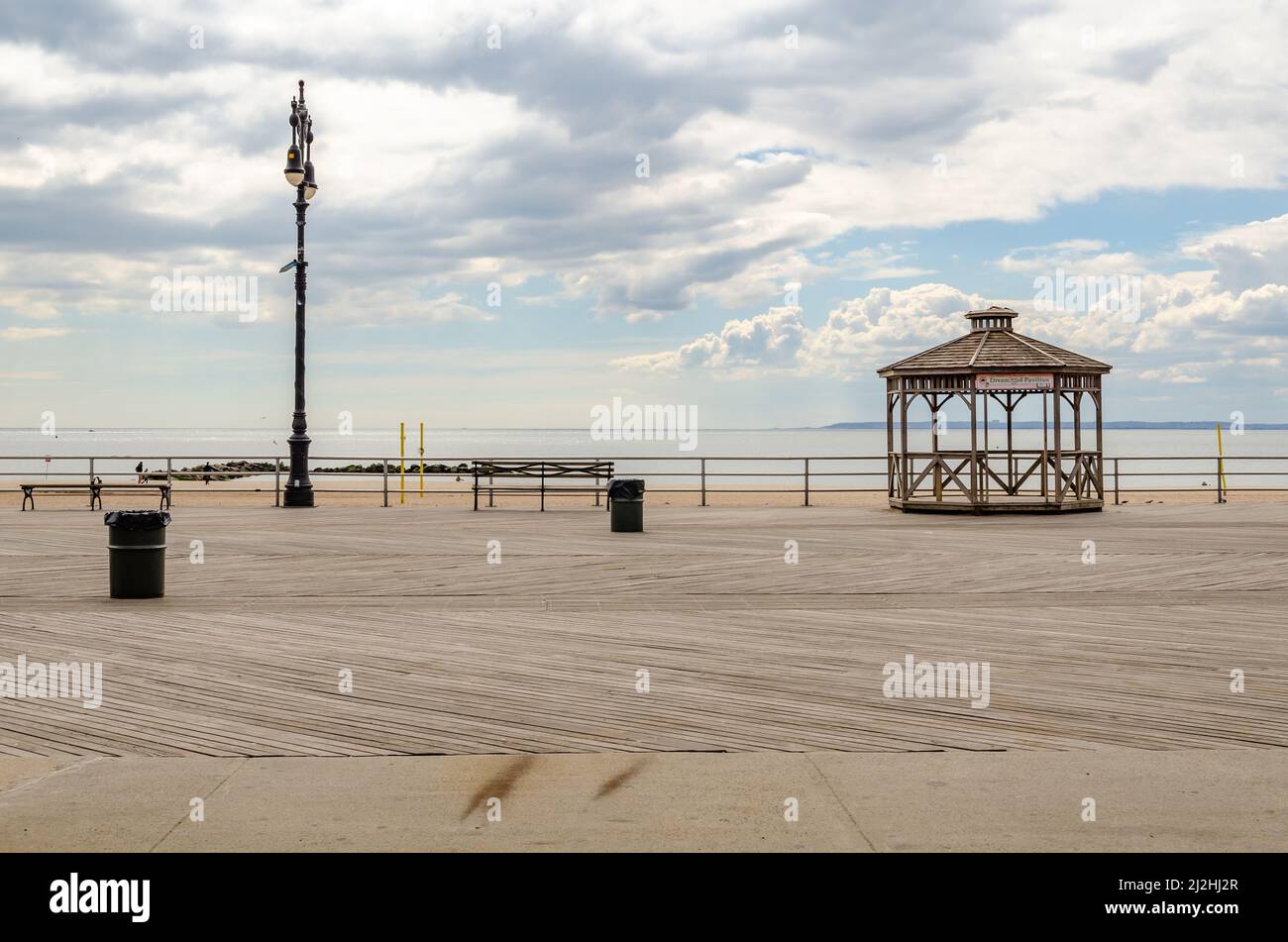 Empty Beach Promenade at Coney island, Brooklyn during sunset with ...