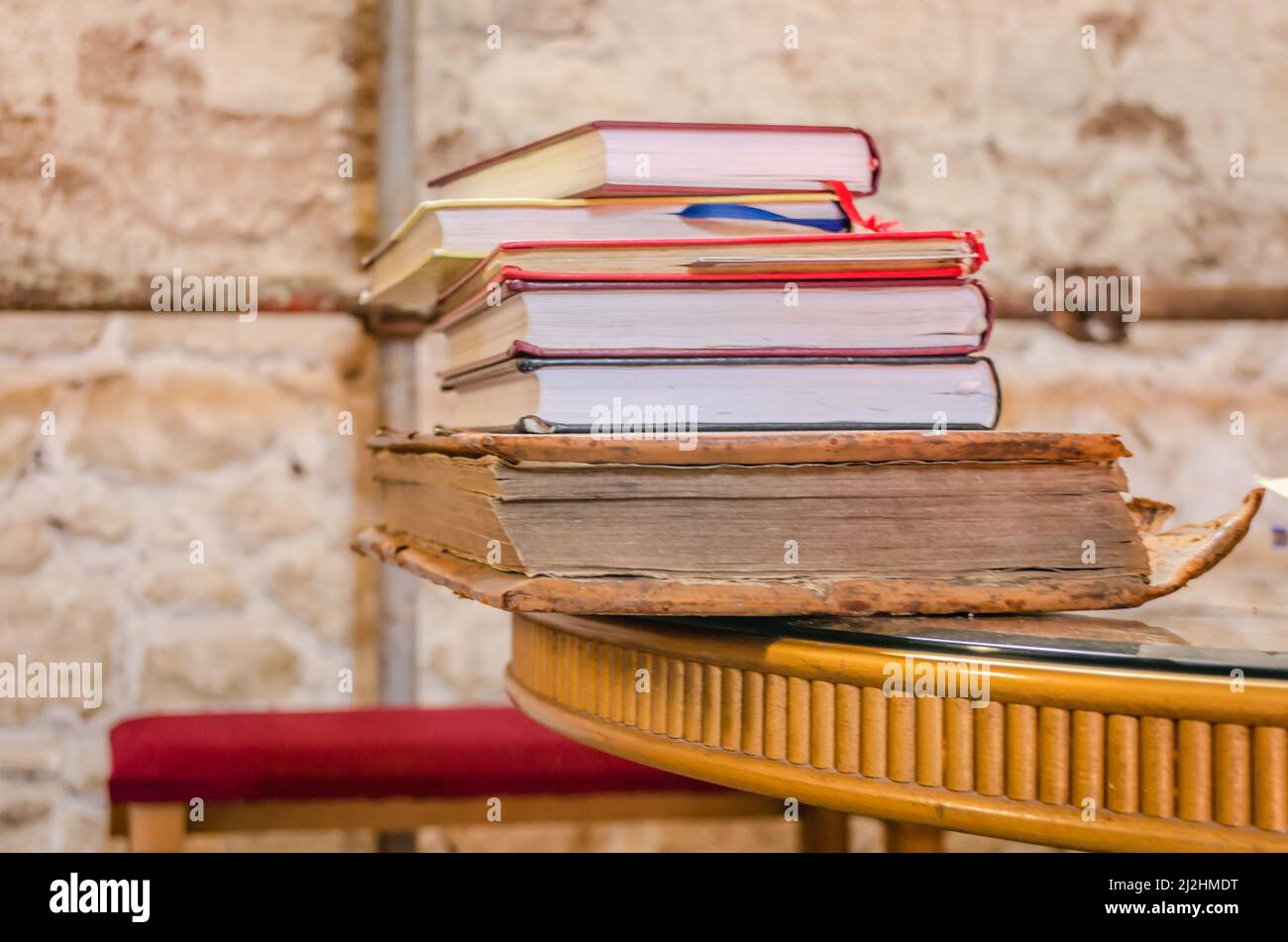 One on top of the other, a pile of stacked old dilapidated books Stock ...