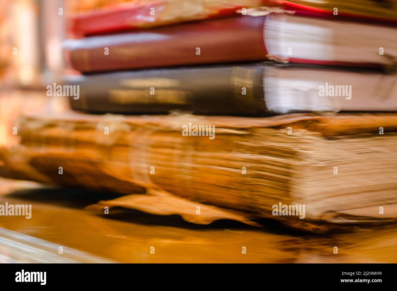 One on top of the other, a pile of stacked old dilapidated books Stock ...