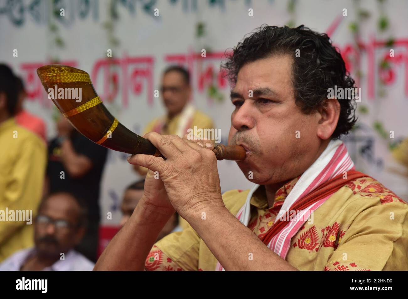 Guwahati, Guwahati, India. 1st Apr, 2022. A Bihu dancer blow pepa ...