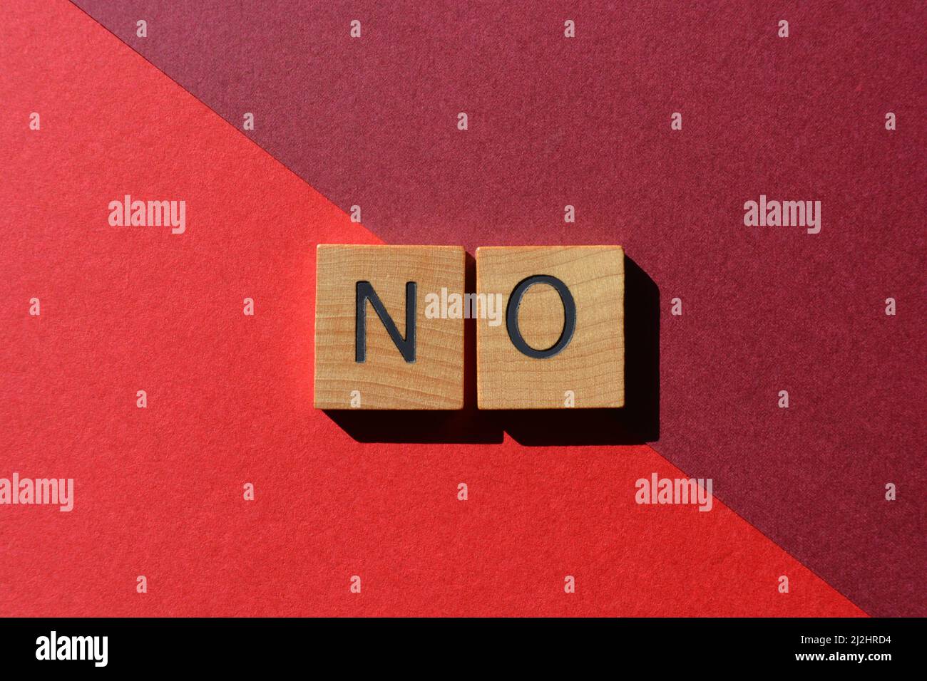 No, word in wooden alphabet letters isolated on red background Stock ...