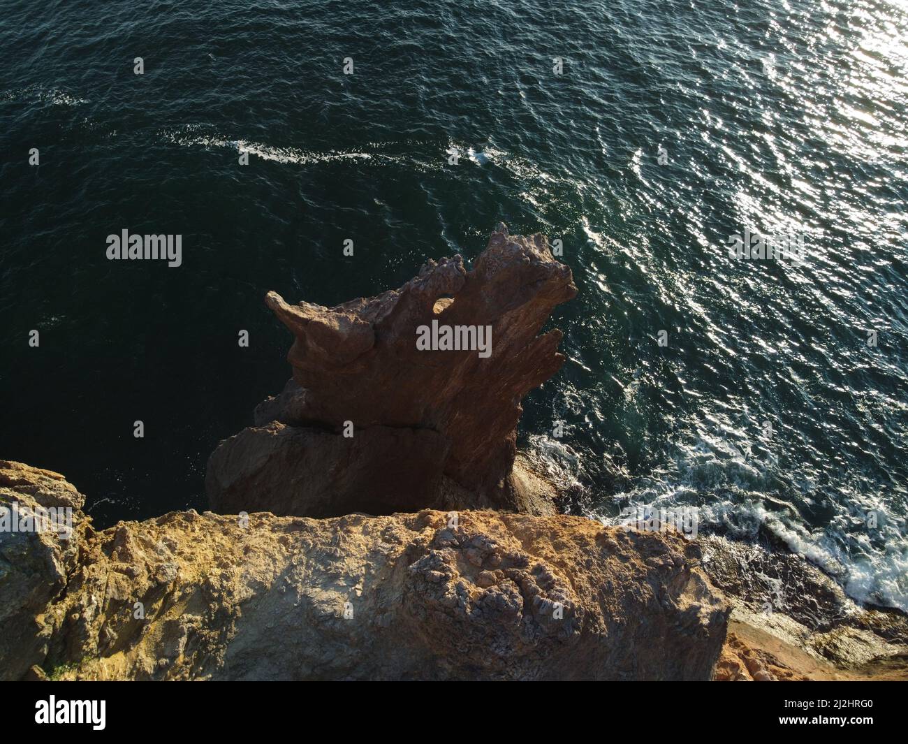 Dragon head arise from the water - The rock or lava formation with the ...