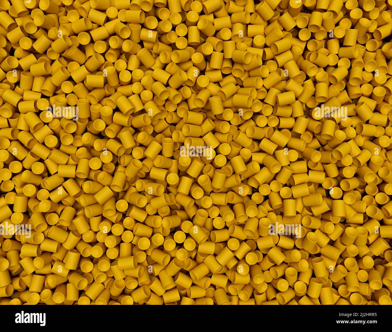 A 3D rendered yellow background of PVC plastic granules Stock Photo - Alamy