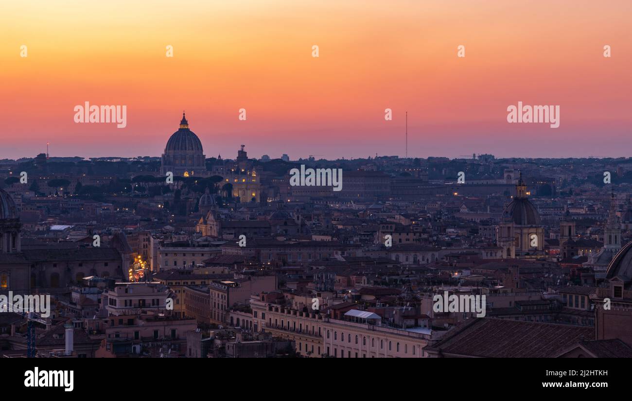 A picture of the St. Peter's Basilica overlooking the city of Rome at ...