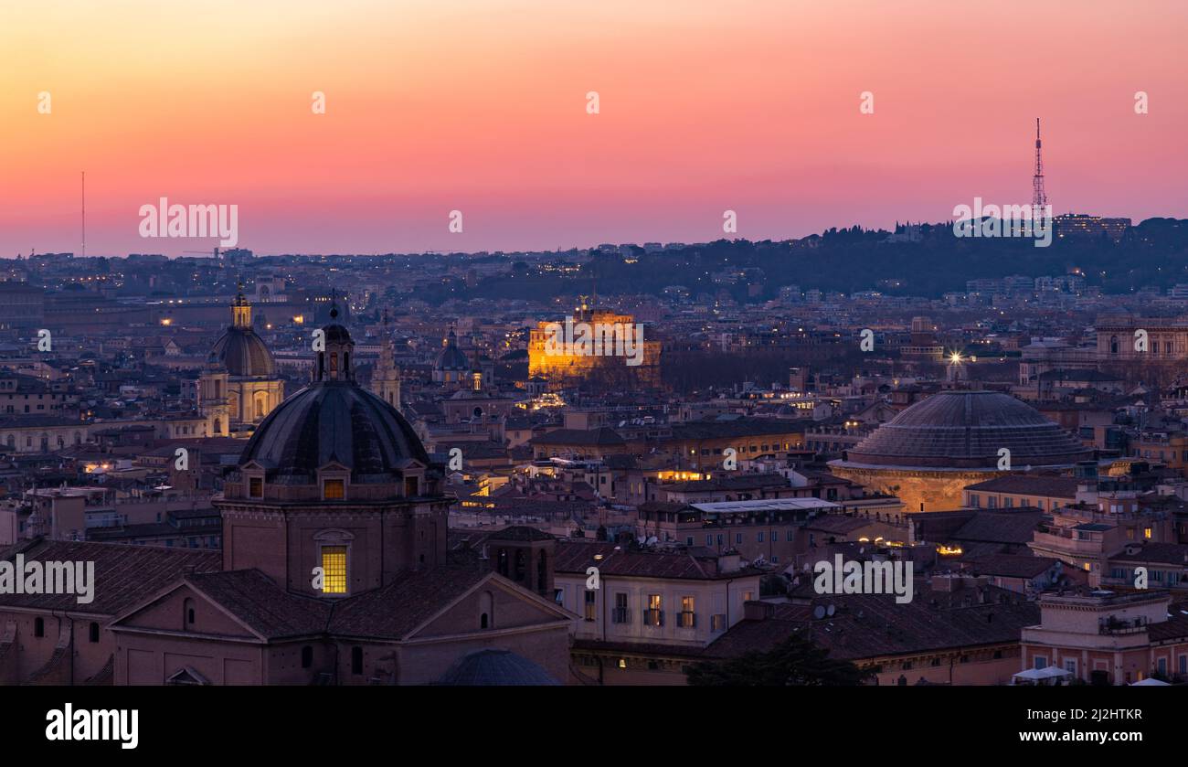 A picture of the Castel Sant'Angelo at sunset, with the Pantheon on the ...