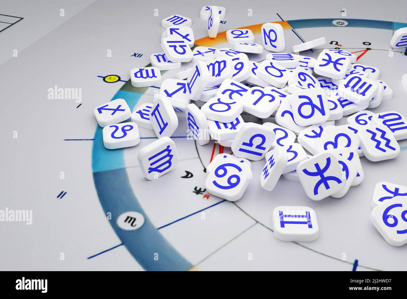 An abstract workplace of an astrologer. White tiles with astrological ...