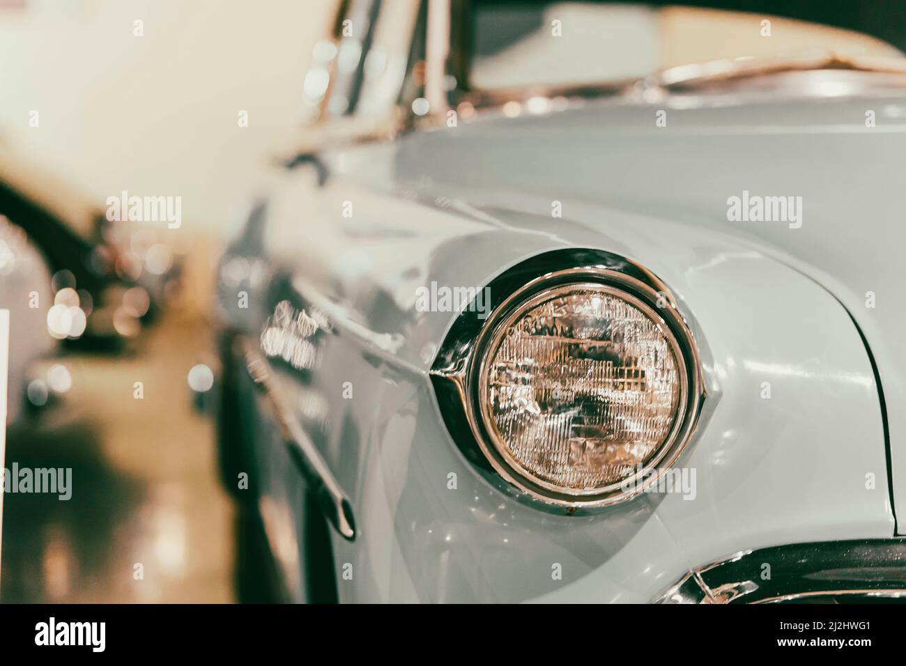 Classic Blue Retro looking Car Headlight with copy space and blurred ...