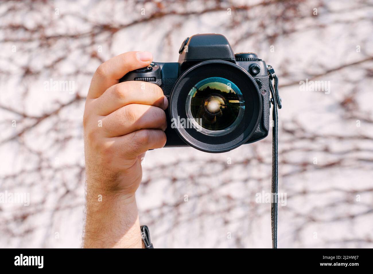 Photography vision. Travel concept. Photo (video) camera in male hand ...