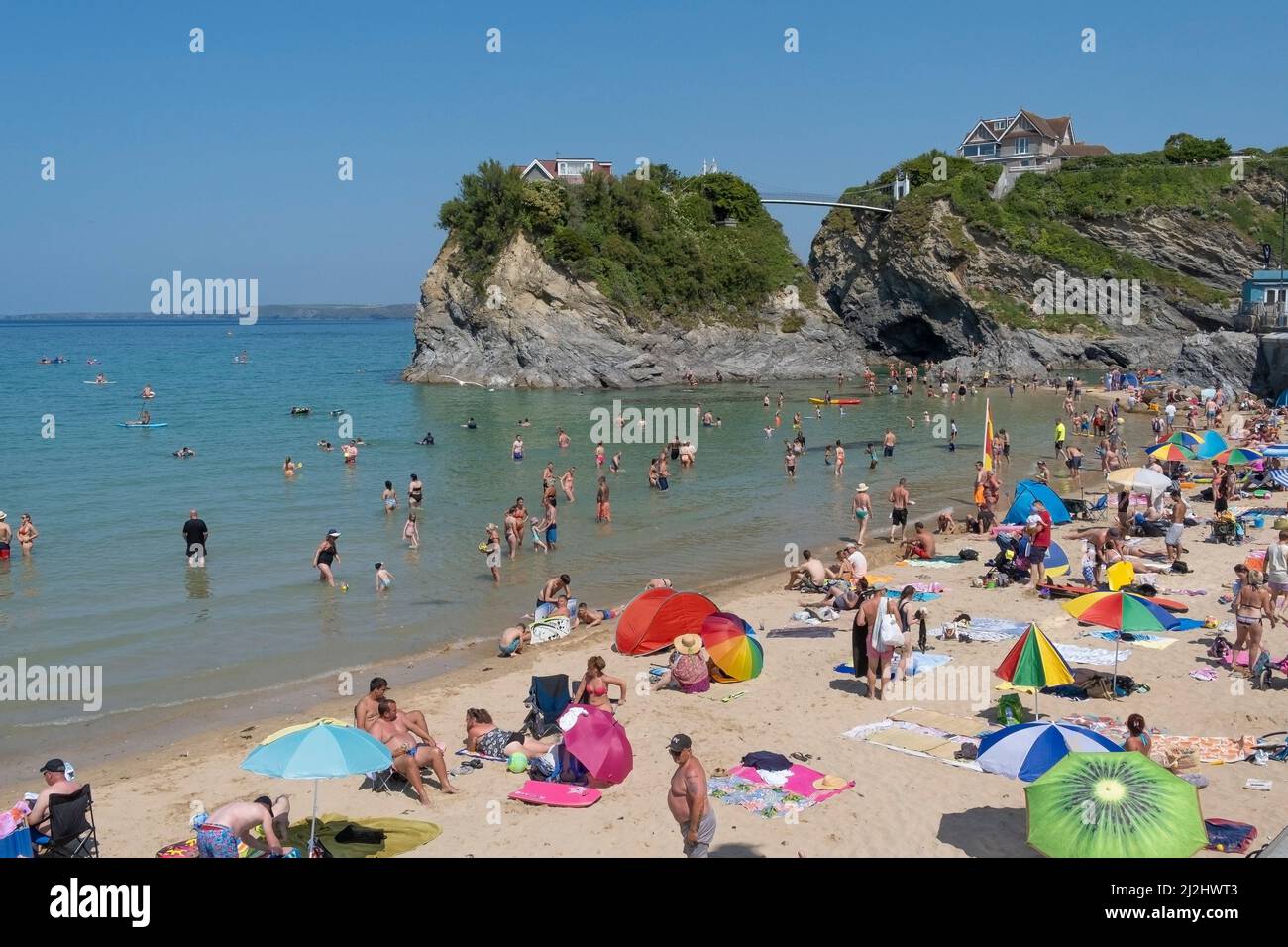 Towan Beach crowded with summer holidaymakers in Newquay in Cornwall ...