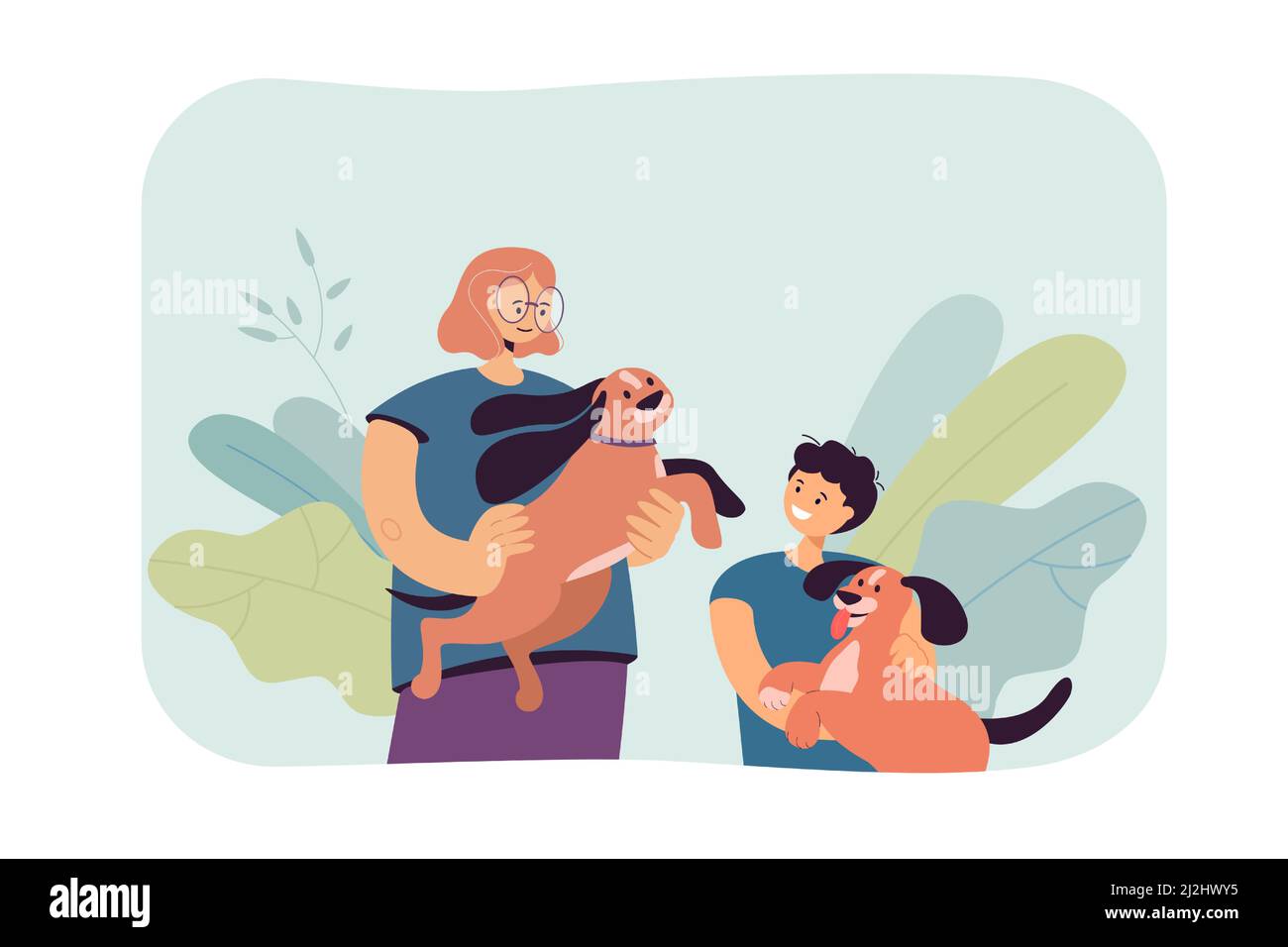 Mother and son holding cute dogs. Parent and child spending time with ...