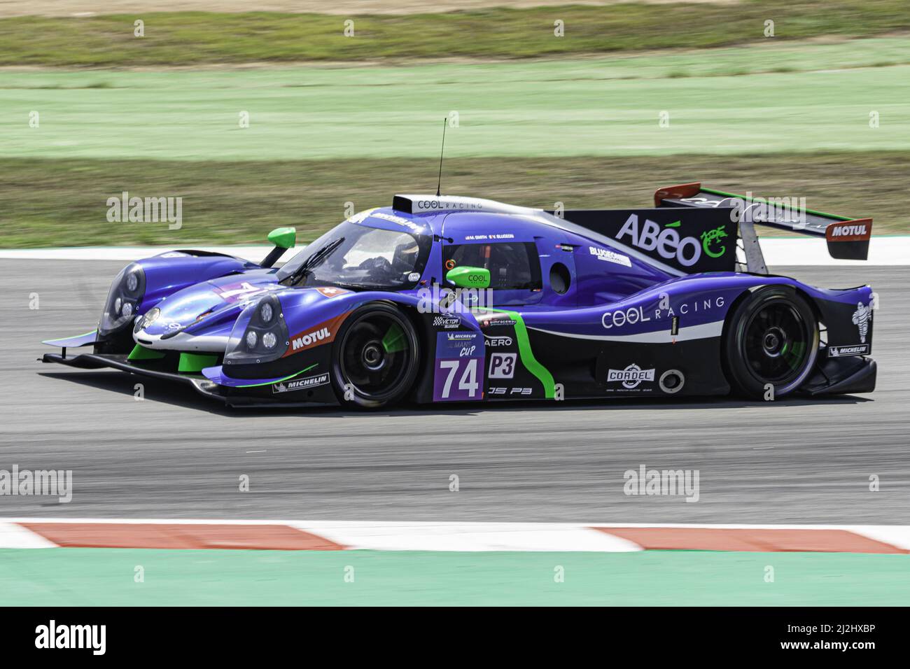 A blue racing car running in the track, Ligier JS P3 Stock Photo - Alamy