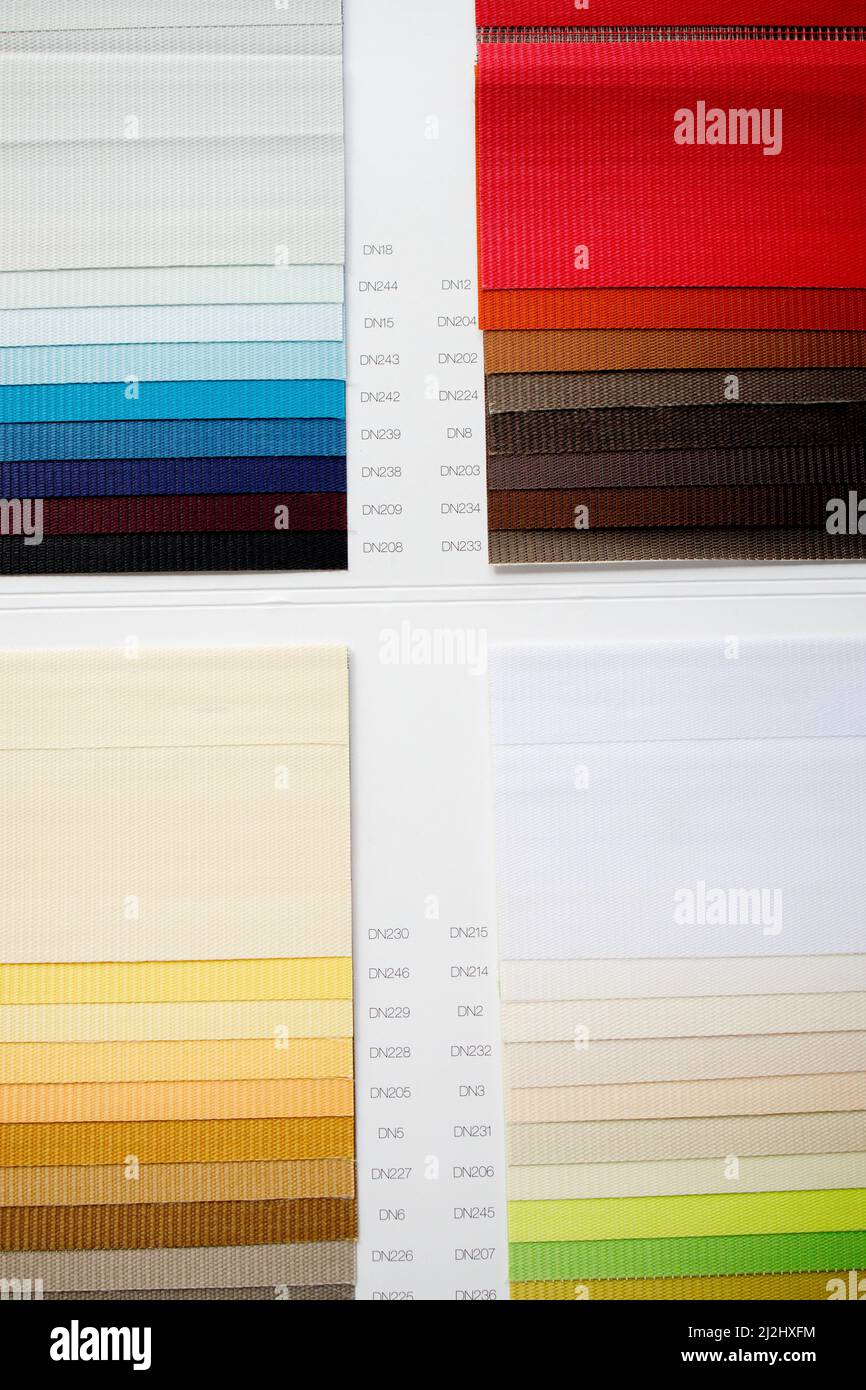 Samples of fabrics of different textures and colors in the form of a ...